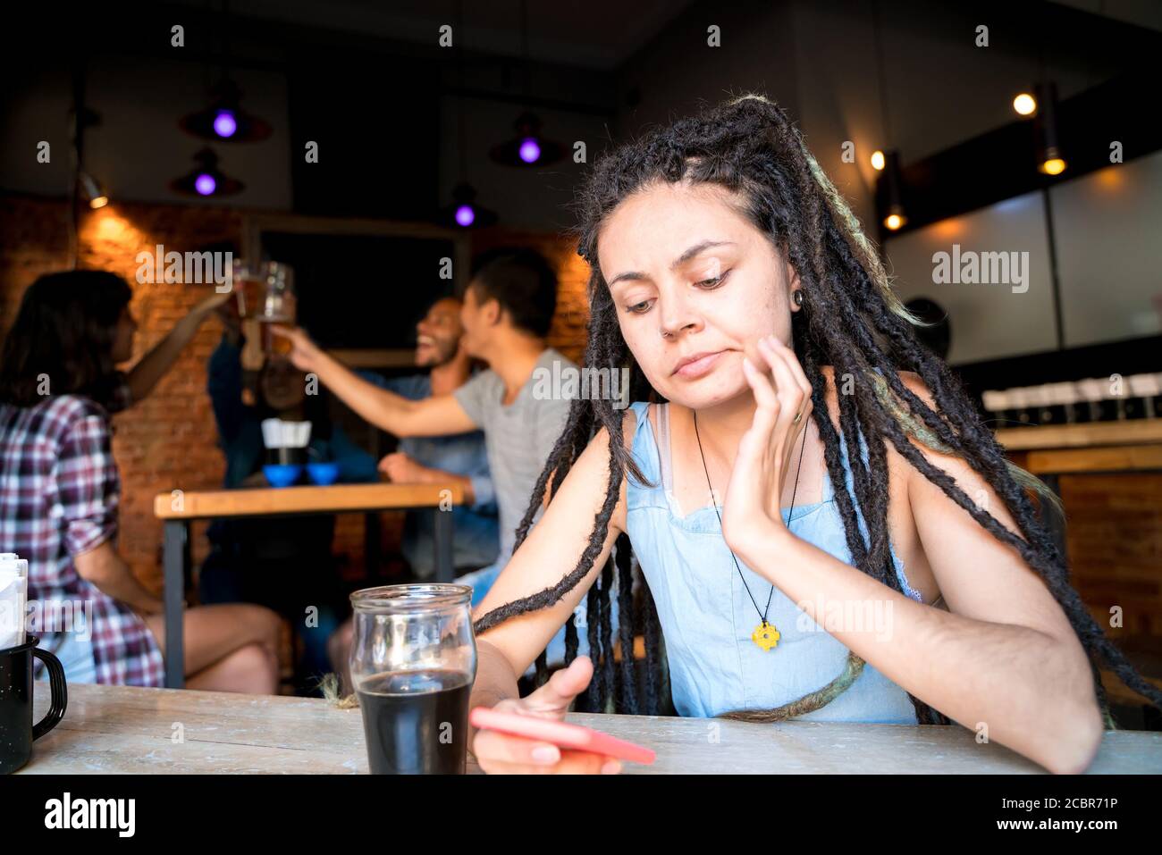 Lonely girl bar hi-res stock photography and images - Alamy