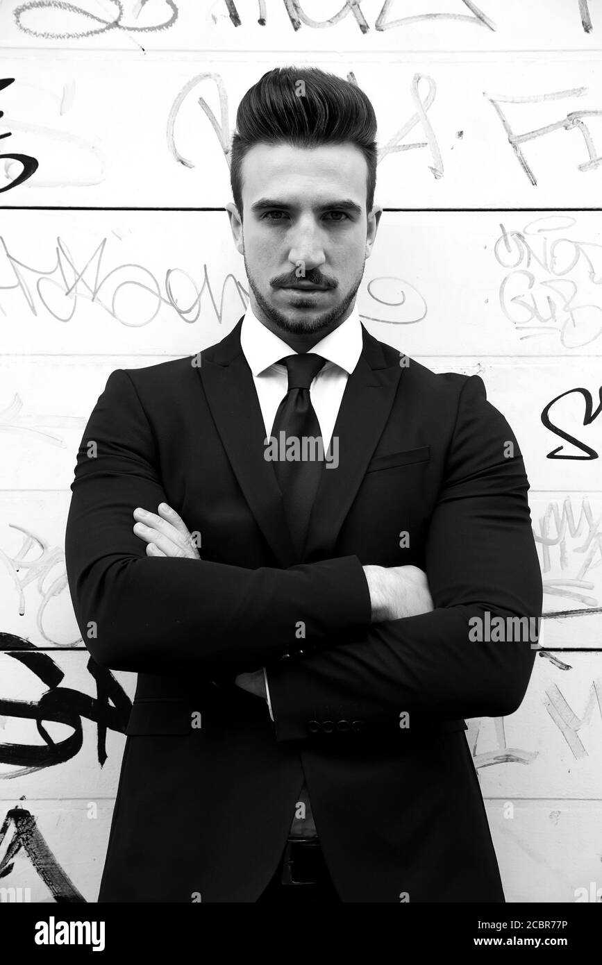 Businessman standing on smart Black and White Stock Photos & Images - Alamy