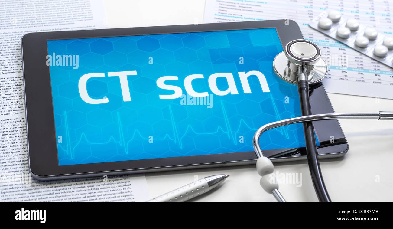 The word CT scan on the display of a tablet Stock Photo - Alamy