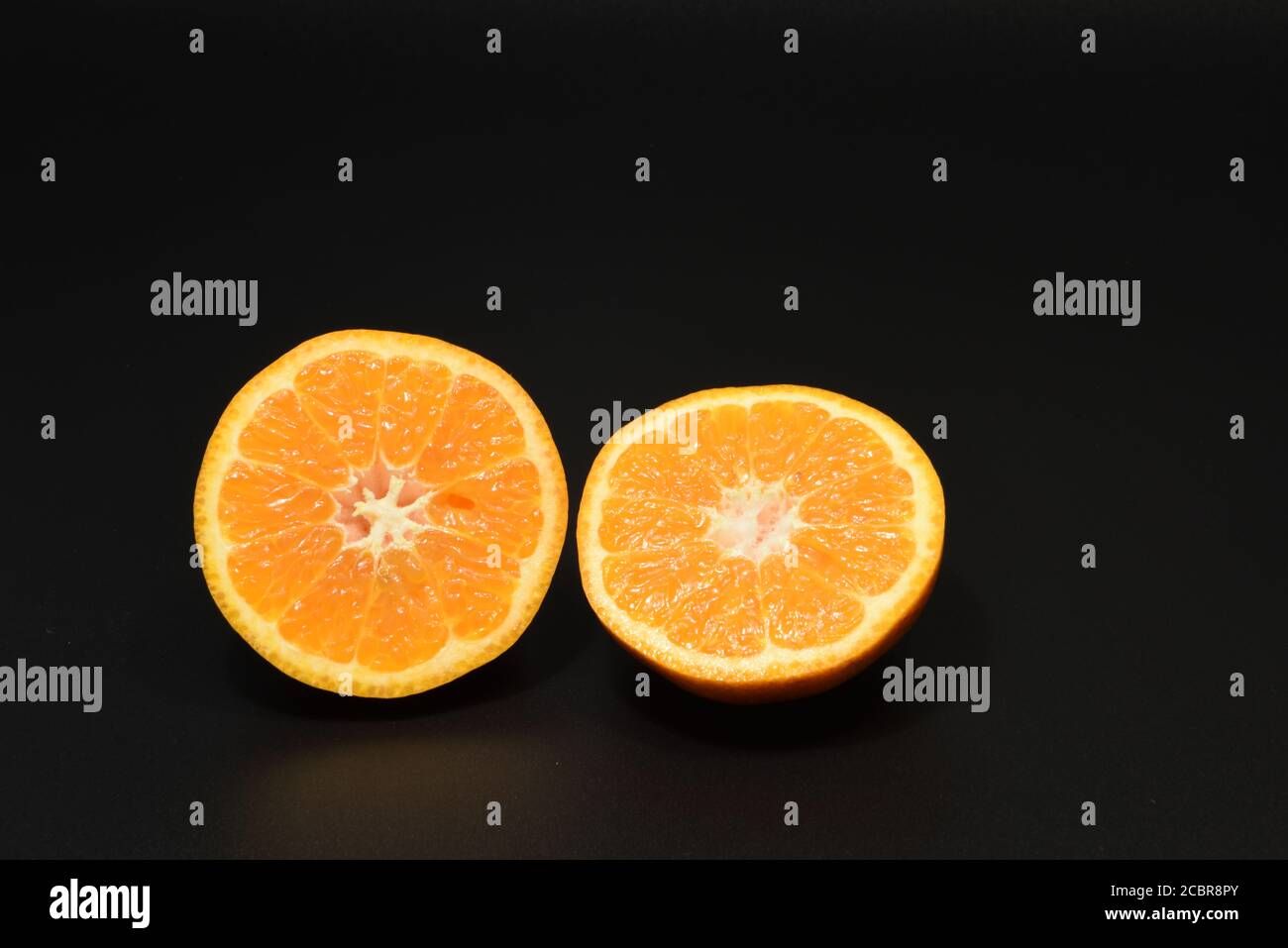 Orange sliced in half hi-res stock photography and images - Alamy