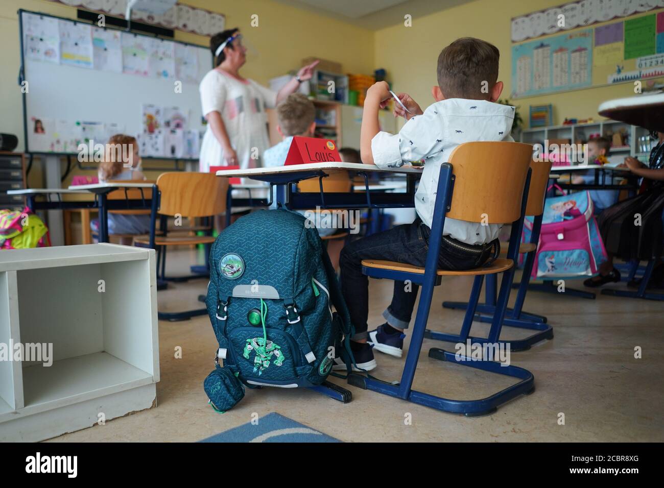 Berlin, Germany. 15th Aug, 2020. First graders sit in their classroom ...