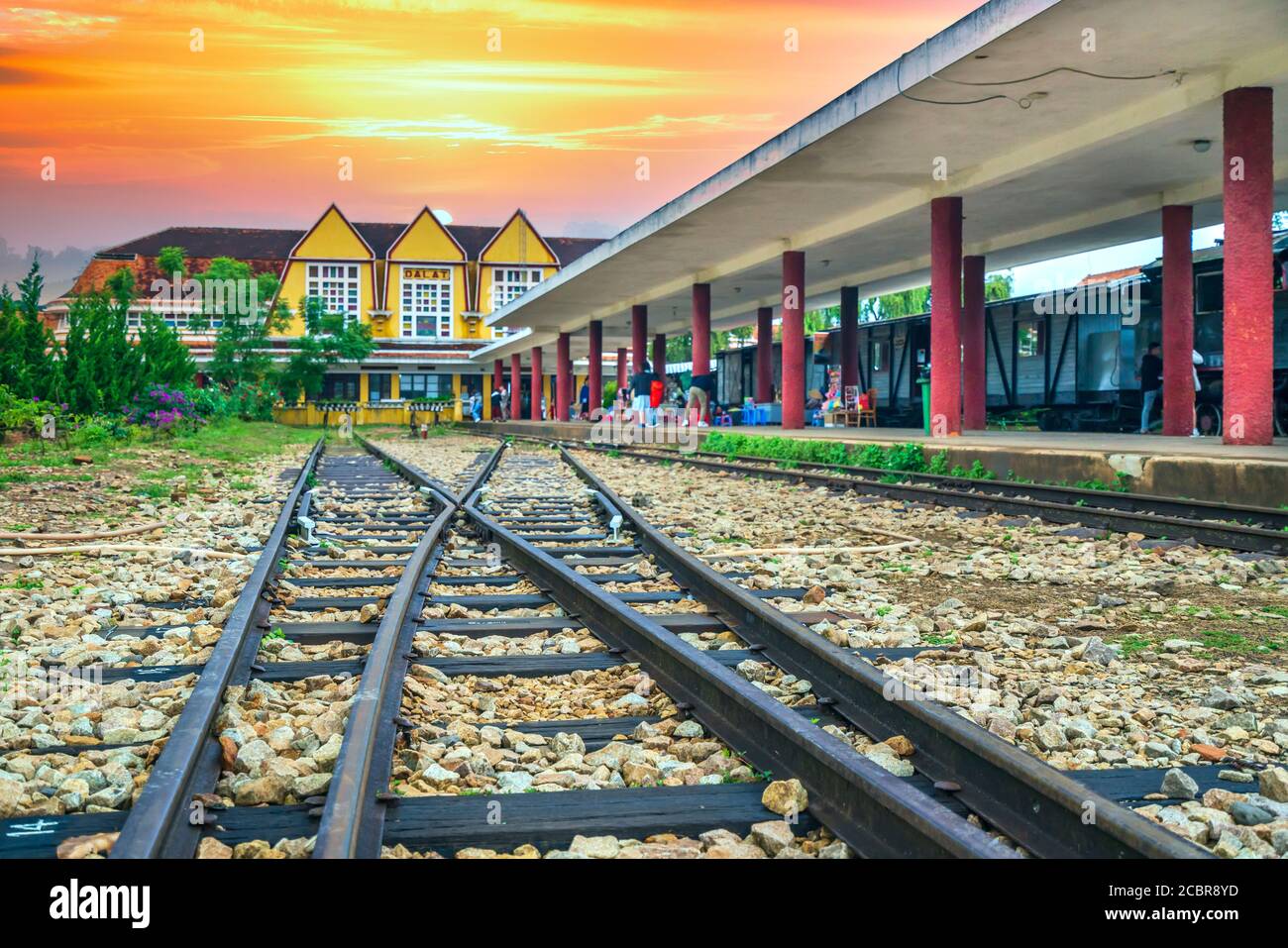 Ancient railway station in sunset sky, history destination for traveler ...