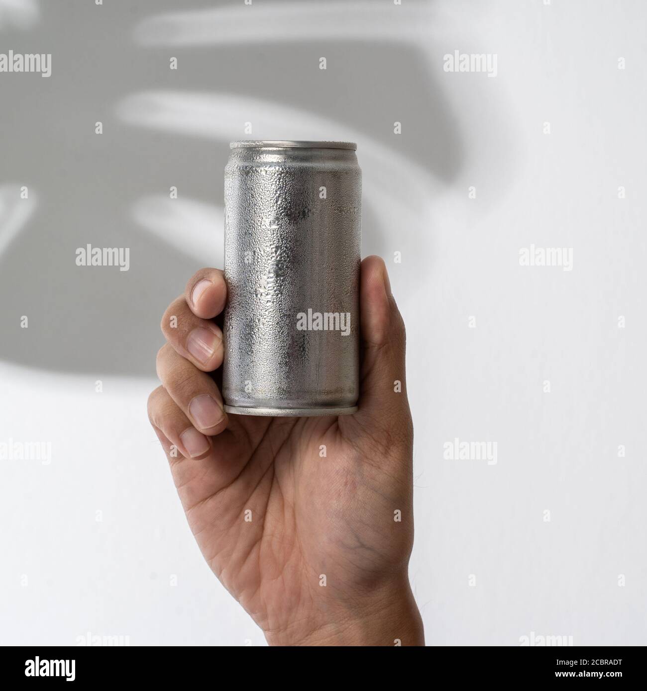 gesture of hand holding plastic bottle product mockup Stock Photo - Alamy