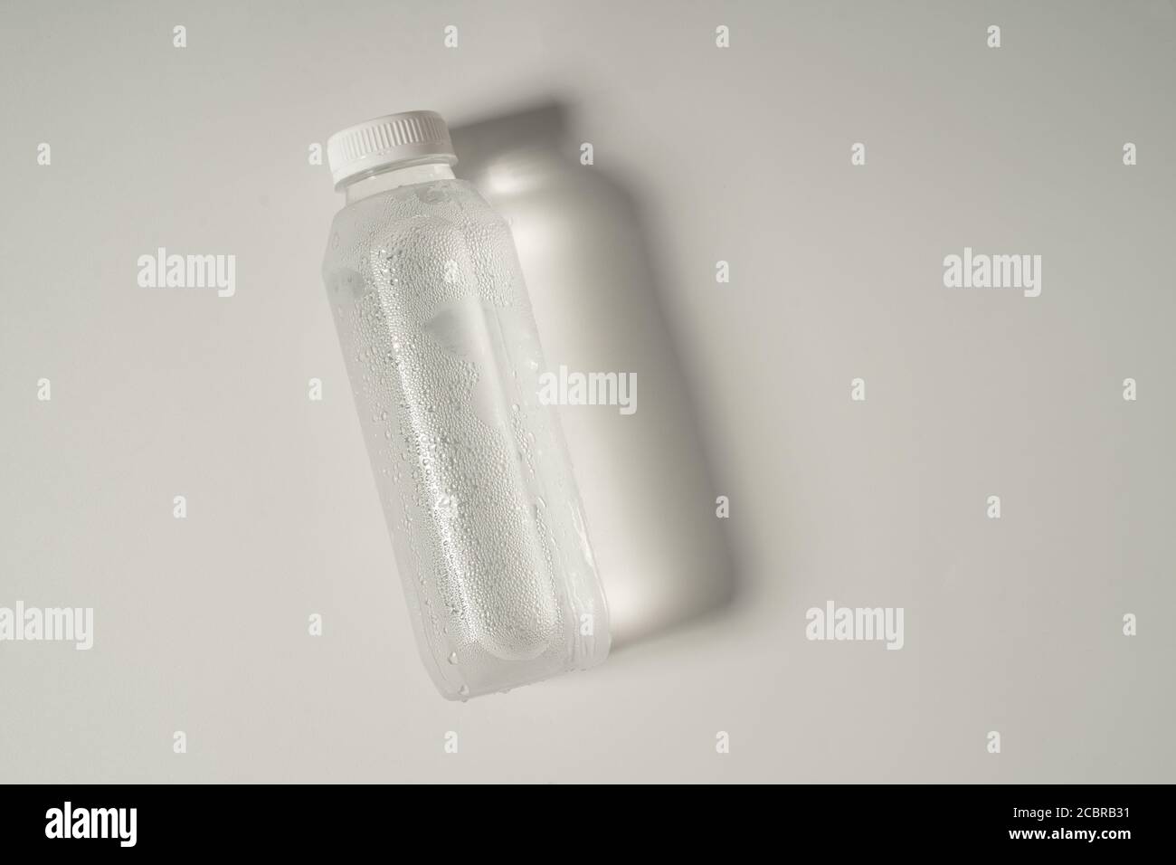 liquid product on blank plastic container bottle mockup Stock Photo - Alamy
