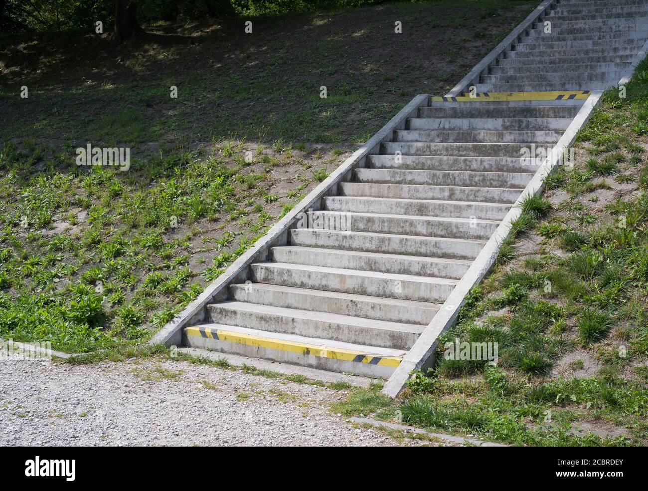 Staircase made of concrete. Green grass is around stairway Stock Photo ...