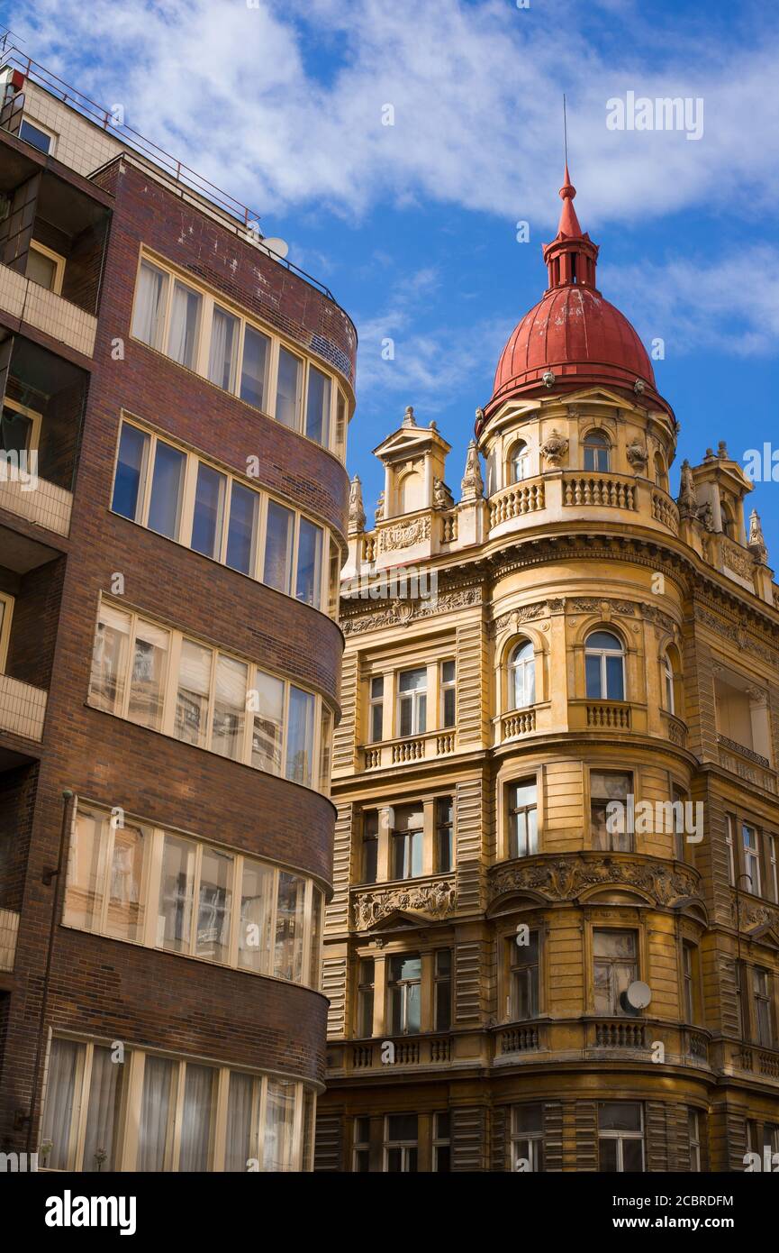 Contrast between old historical townhouse with a lot of decoration and ...