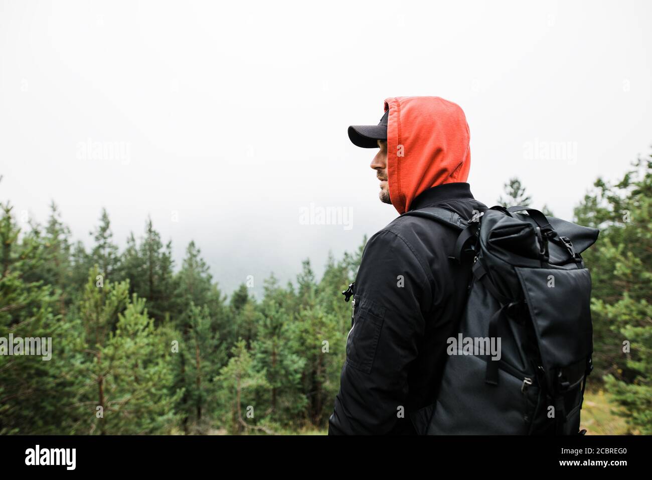 Back view young man traveller hi-res stock photography and images - Alamy