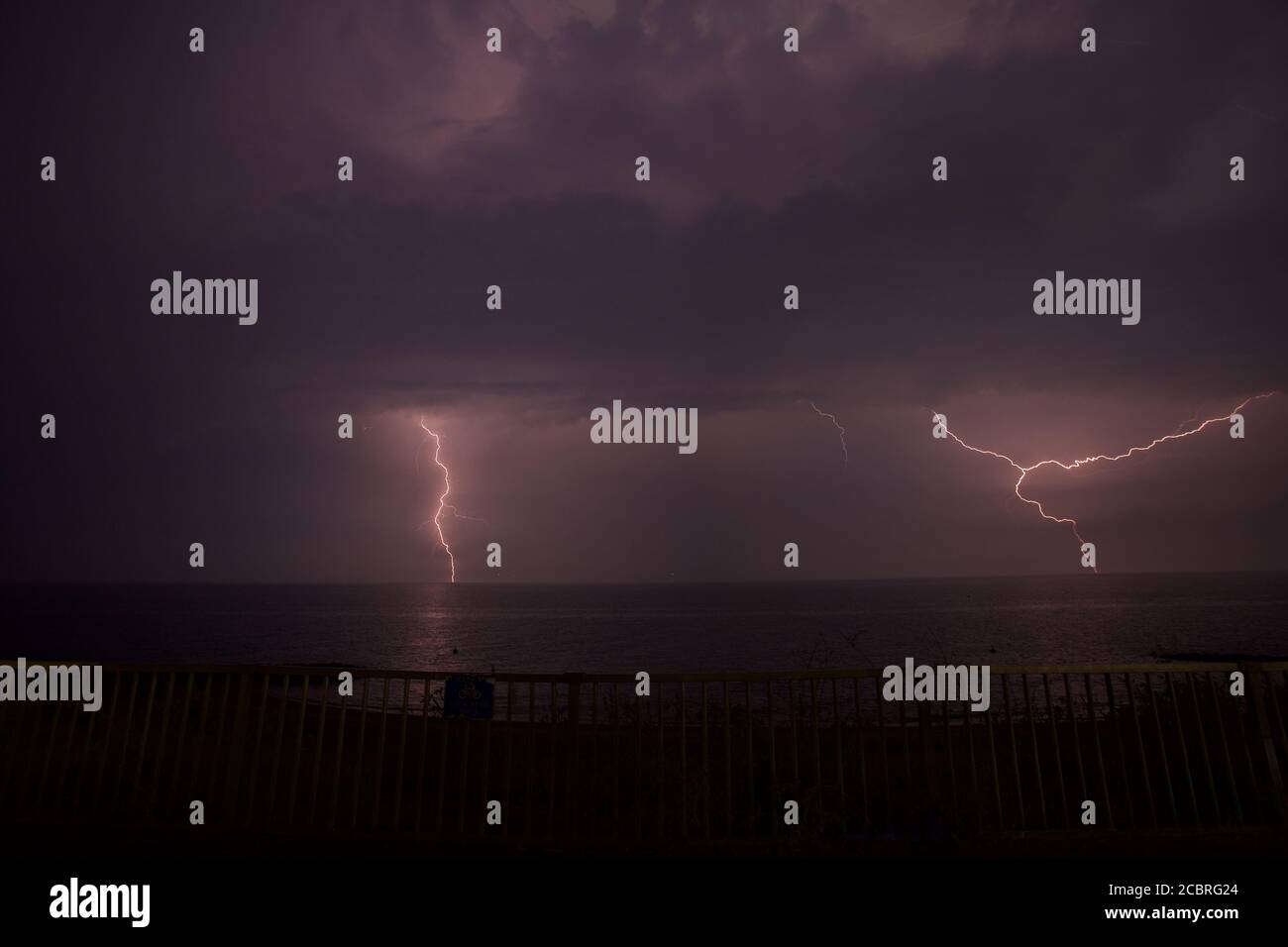 Lightning strike over Gunfleet Sands wind farm off Clacton on Sea Stock ...