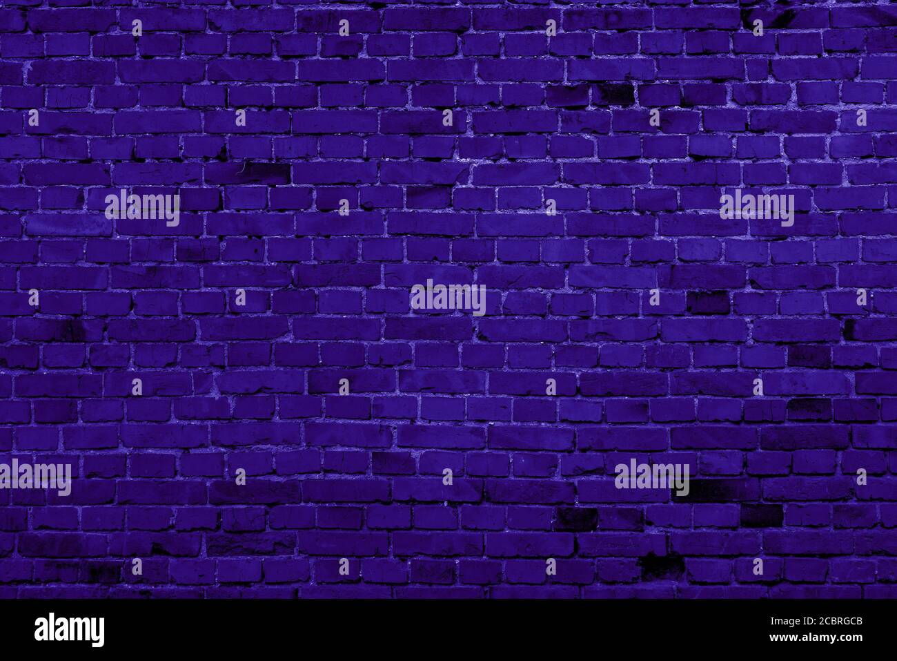 Violet brick building wall. Interior of a modern loft. Background for ...
