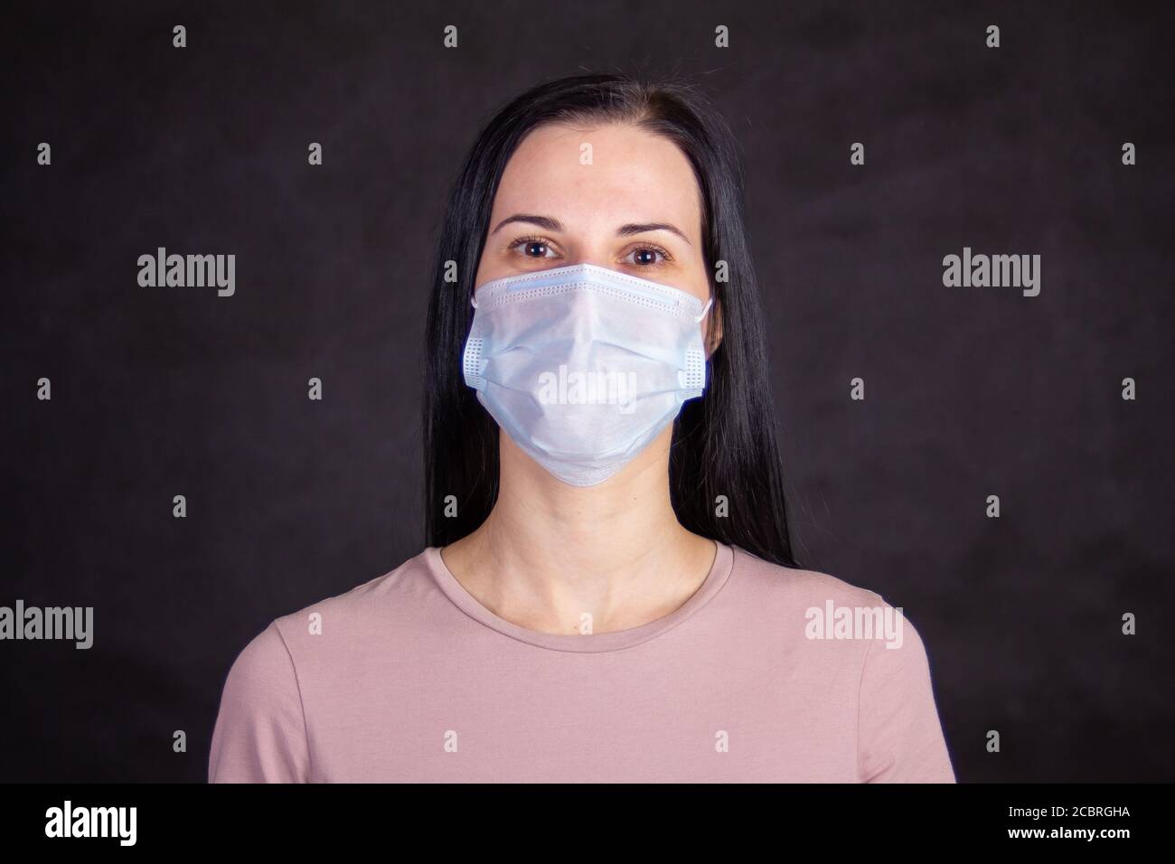 A person posing for the camera Stock Photo - Alamy