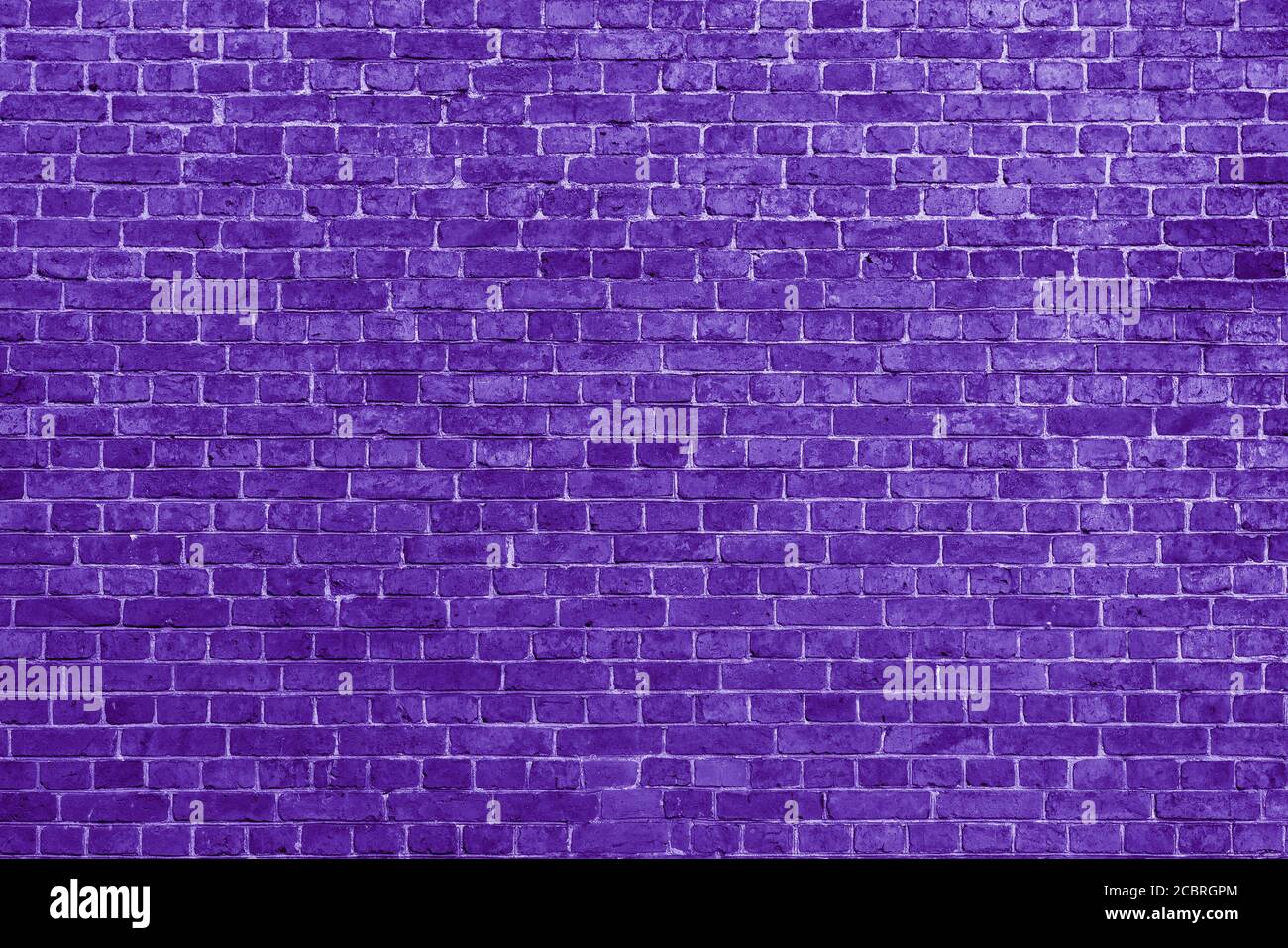 Violet brick building wall. Interior of a modern loft. Background for ...