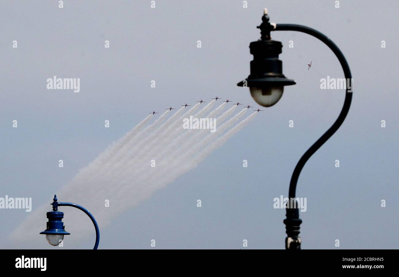 The Red Arrows fly over the Titanic slipway, the Titanic Museum and the ...