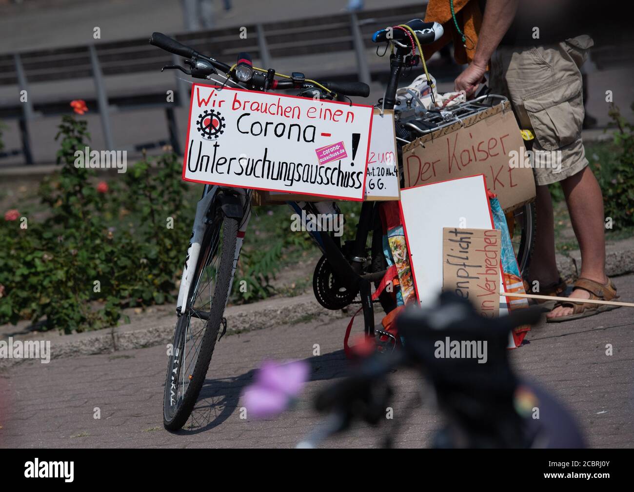 15 August 2020, Berlin: A participant of the "10th Freedom Parade ...