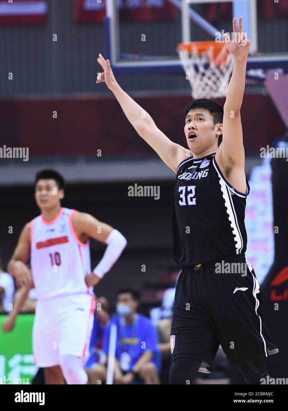 Qingdao, China's Shandong Province. 15th Aug, 2020. Wang Huadong (R) of ...