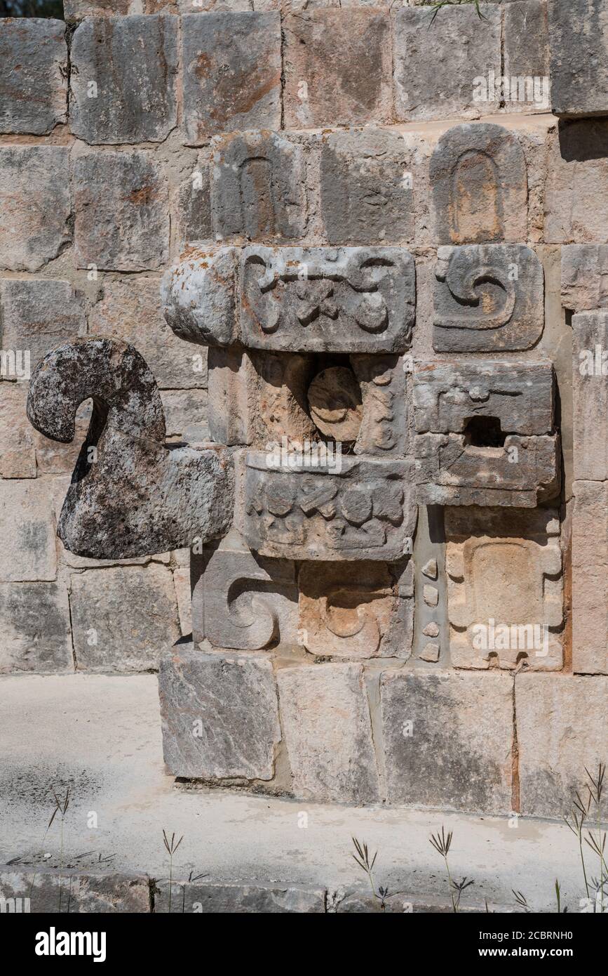 A row of Chaac masks line the stairway on the west facade of the ...