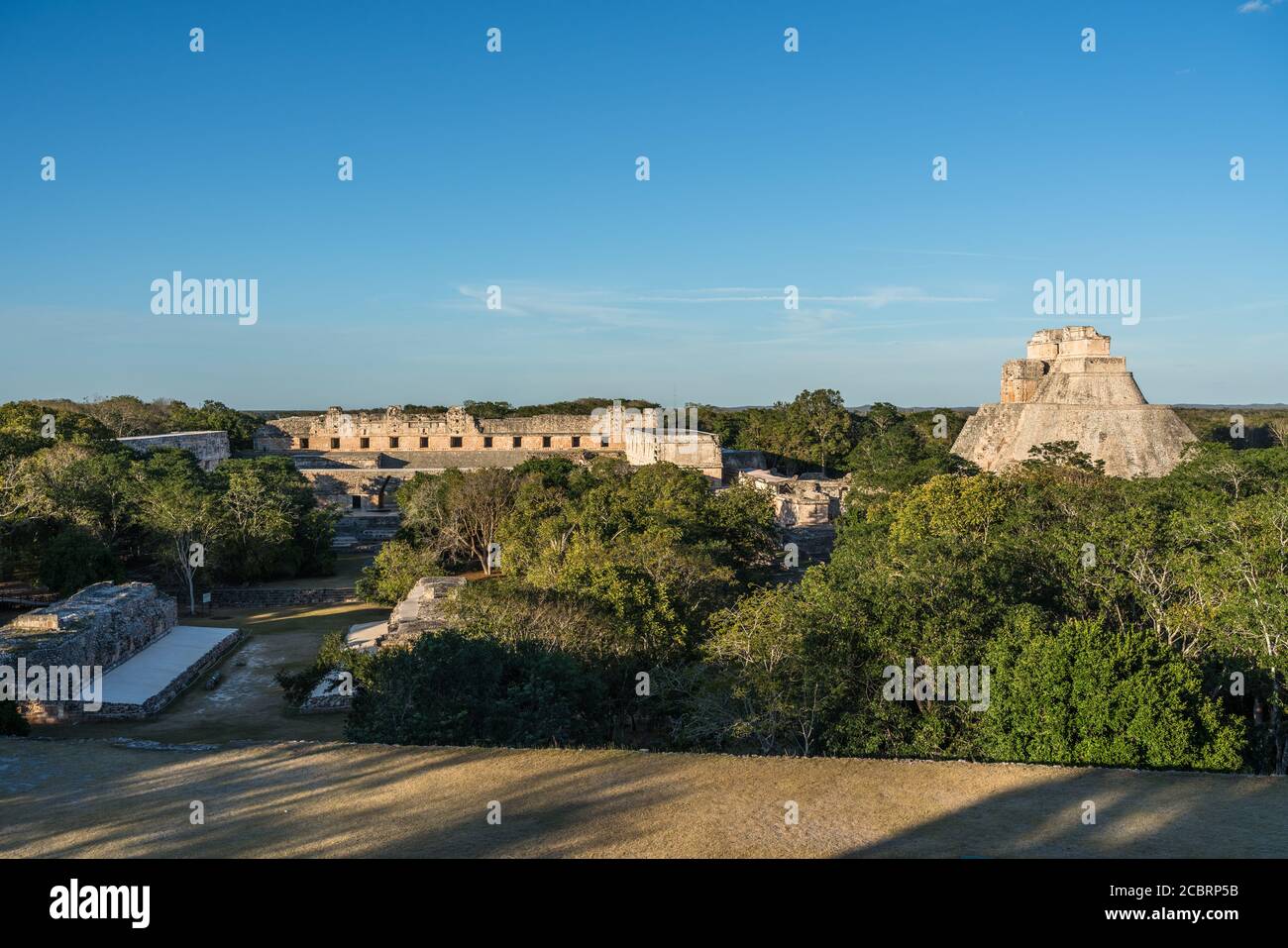 A view of the ceremonial ball court with the Nunnery behind in the pre ...
