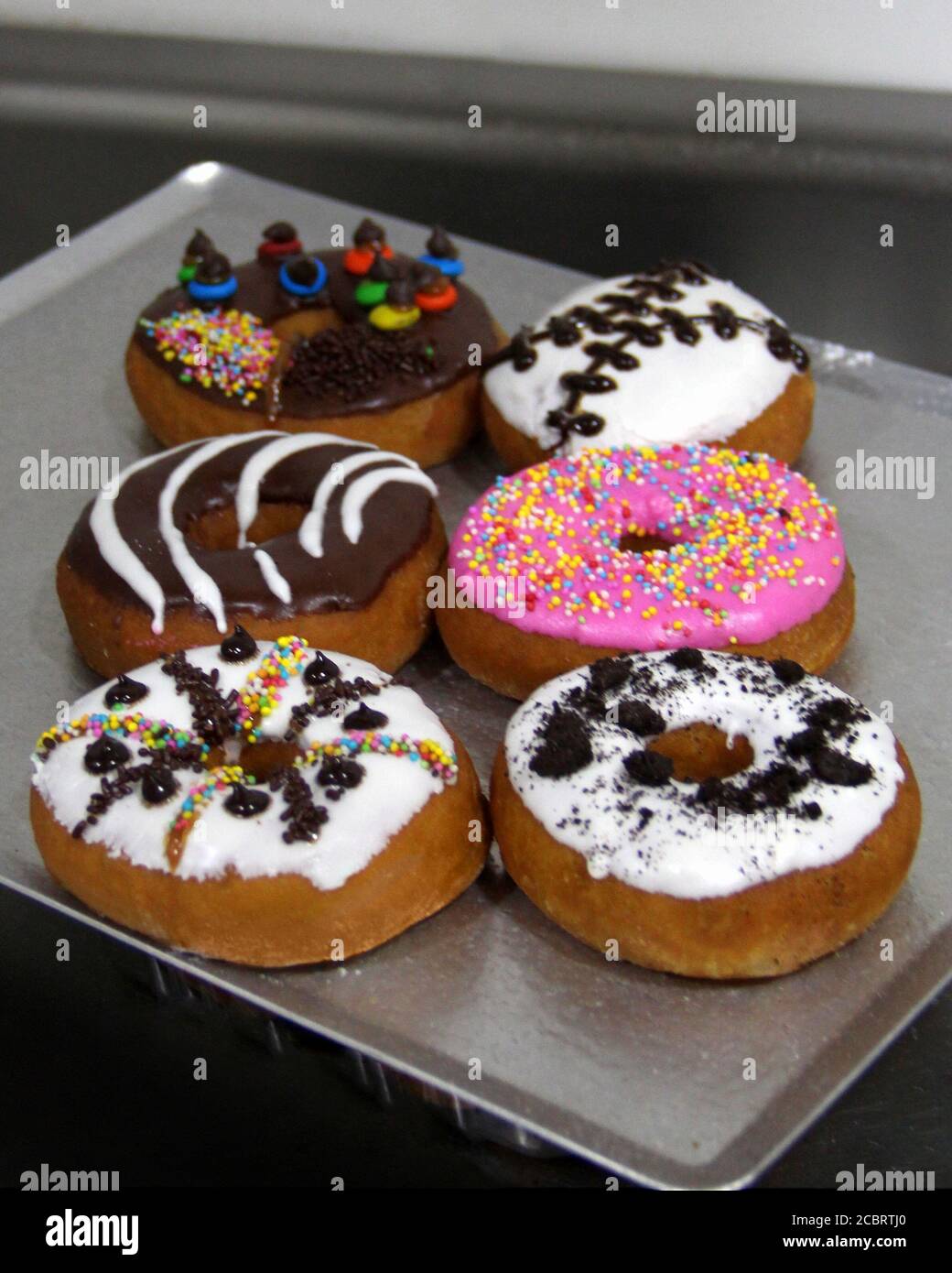 Delicious Colored Donuts Stock Photo - Alamy