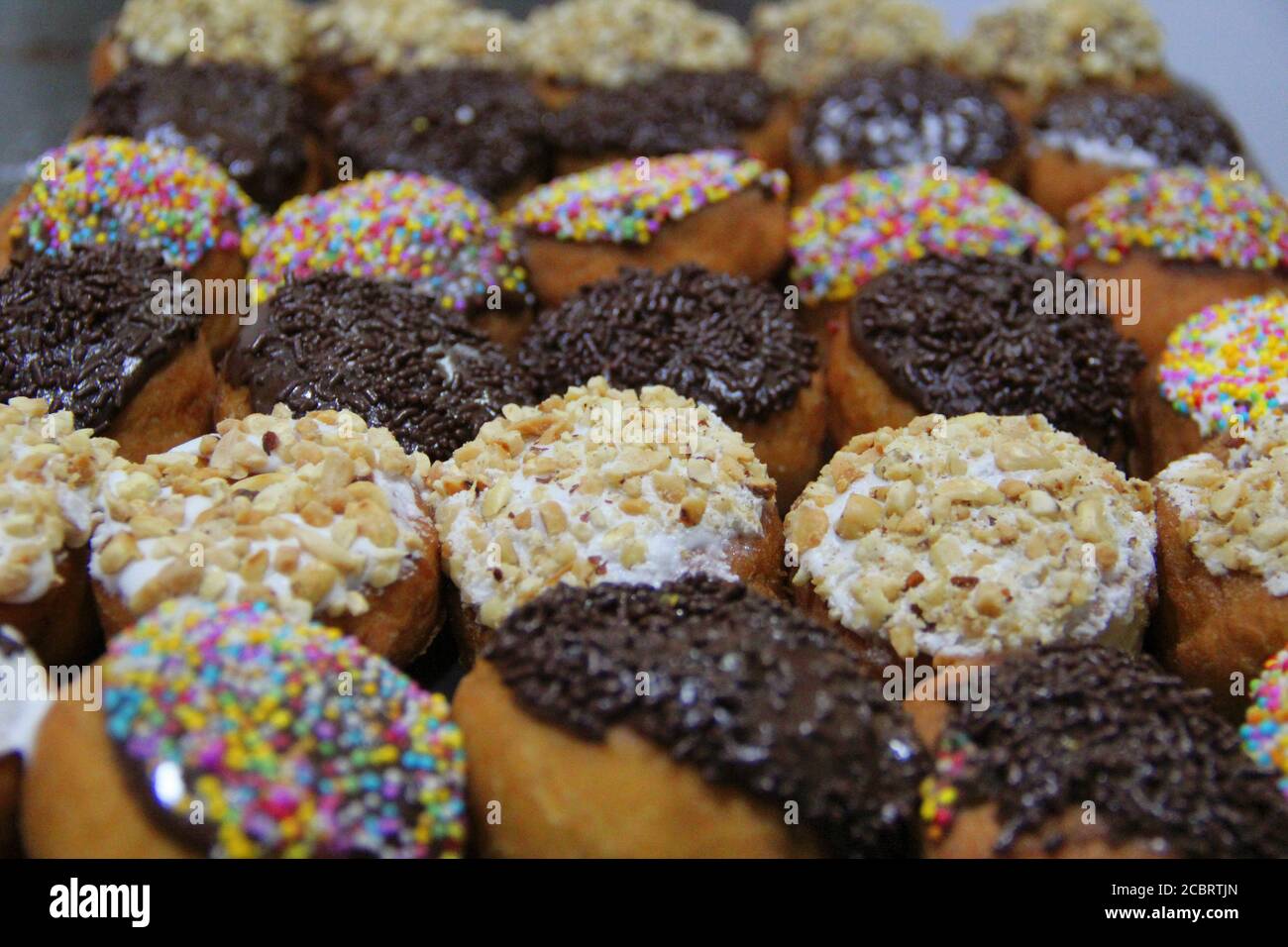 Delicious Colored Donuts Stock Photo - Alamy
