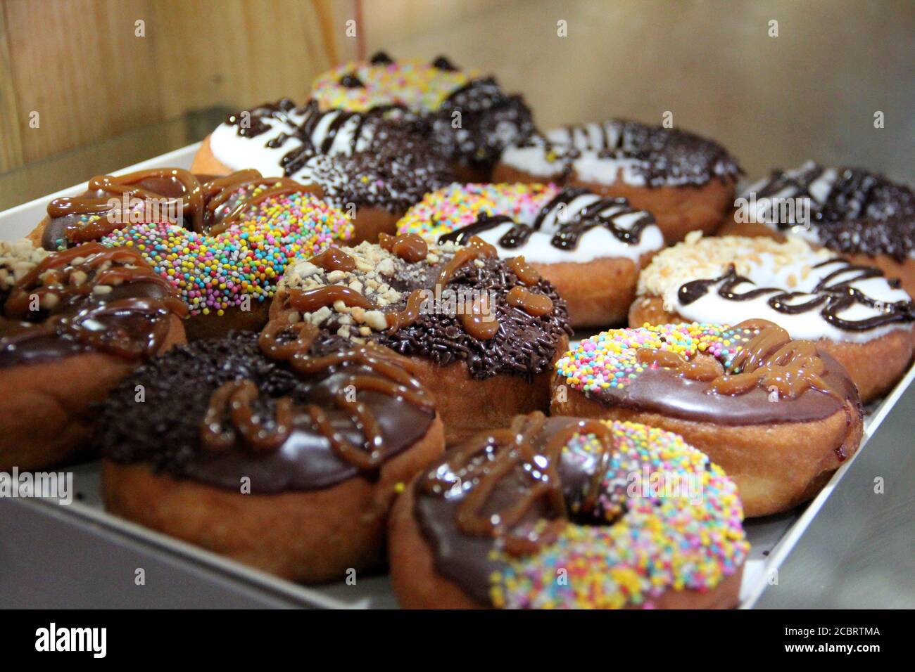 Delicious Colored Donuts Stock Photo - Alamy