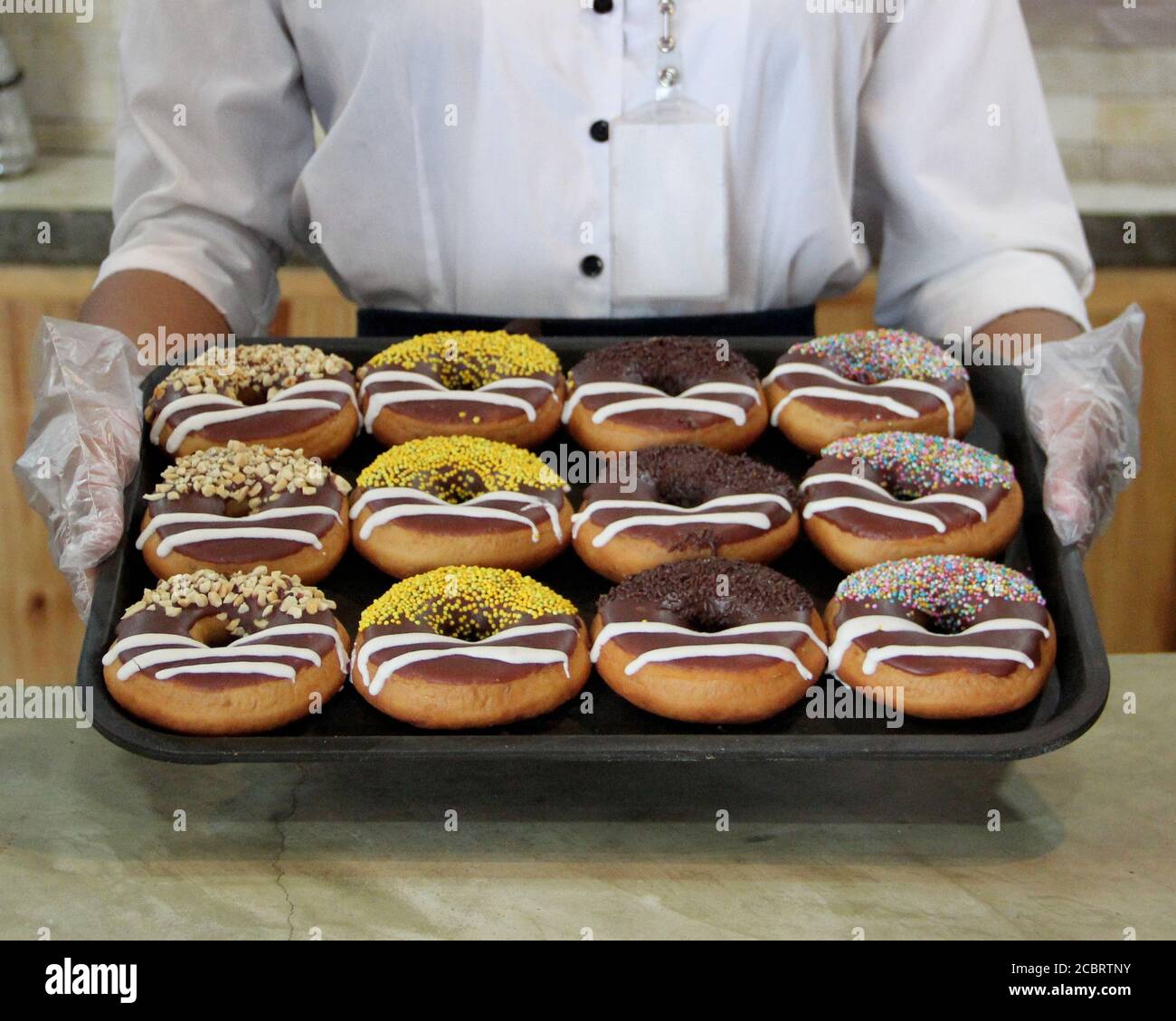 Delicious Colored Donuts Stock Photo - Alamy