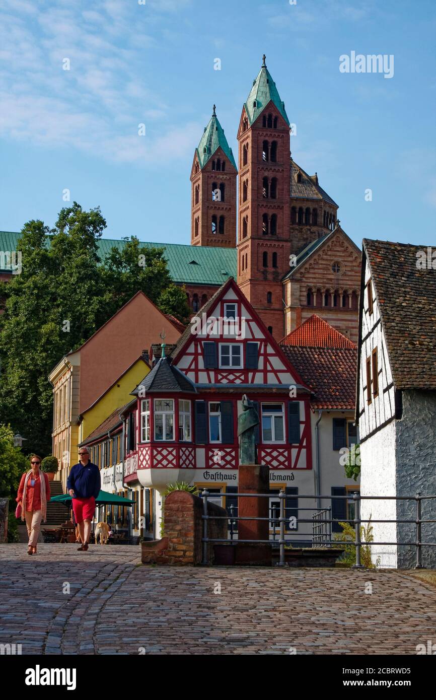 city scene, half-timbered building, Edith Stein statue, church steeples ...