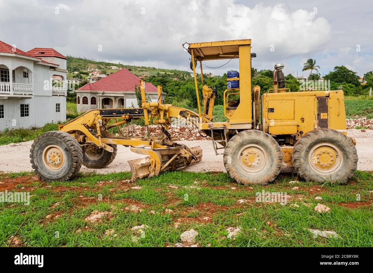 Motor Grader Parked On Work Site Stock Photo - Alamy