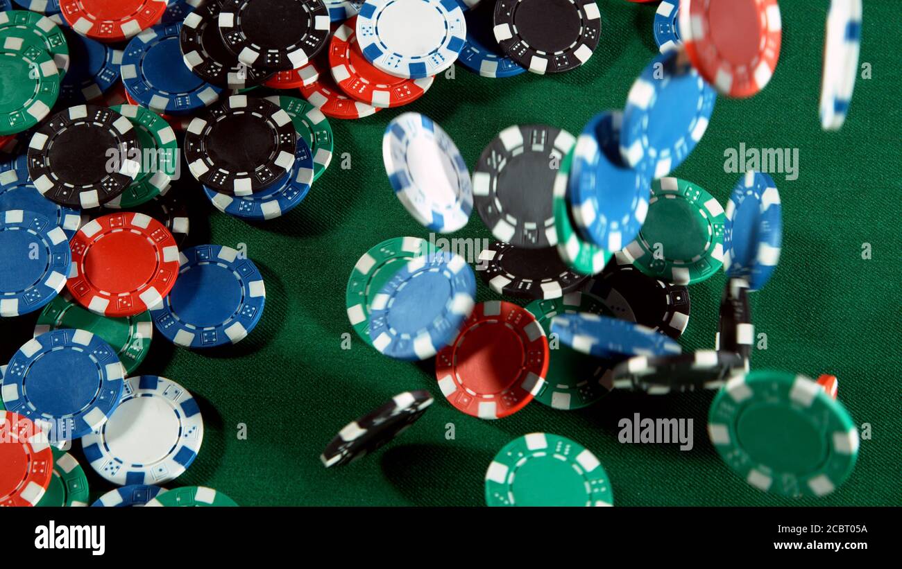 Poker still life with falling poker chips . Concept of hazard gaming ...