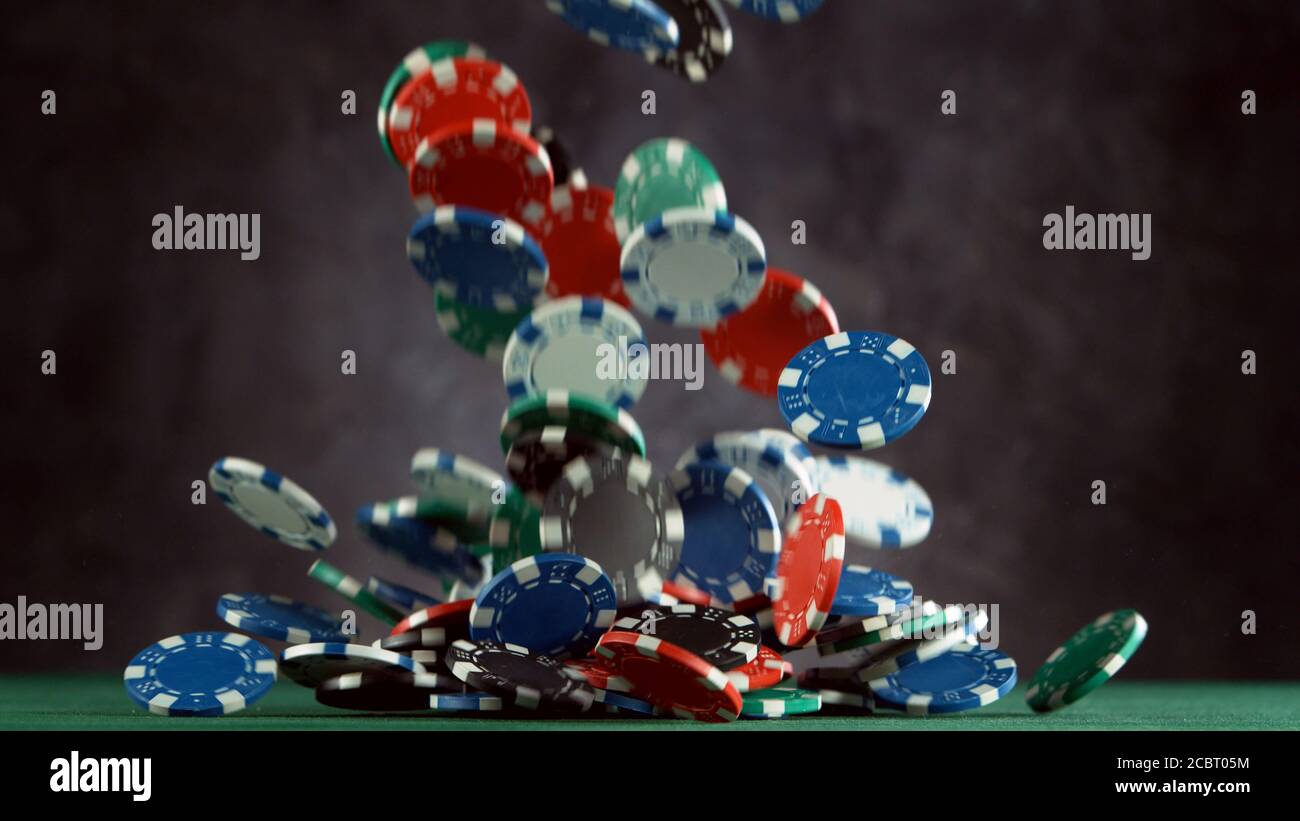 Poker still life with falling poker chips . Concept of hazard gaming ...