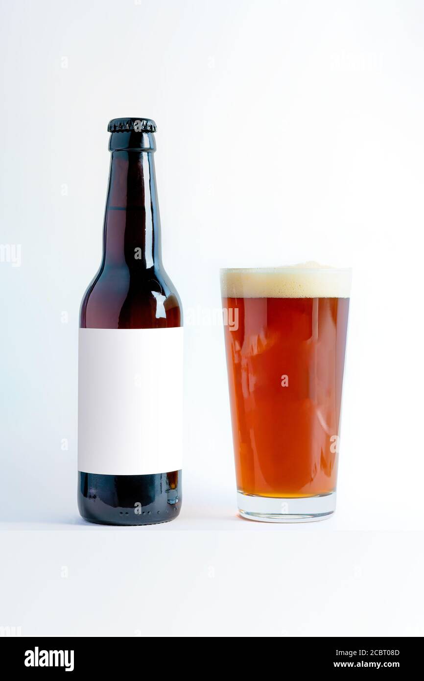 Beer Bottle Mock-Up with glass of altbier and foam. Blank Label on ...