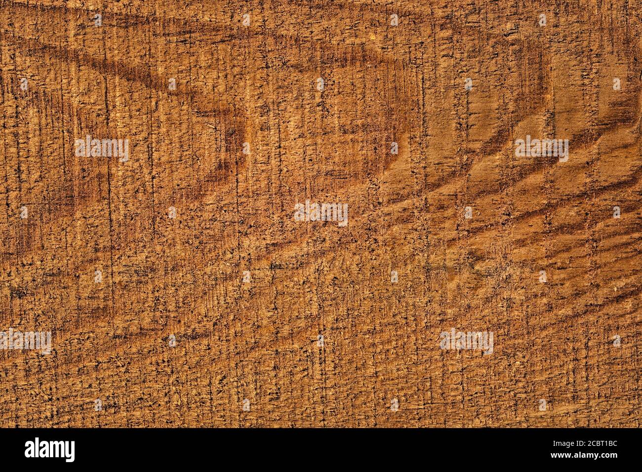 texture of a rough surface of dark wood with natural patterns ...