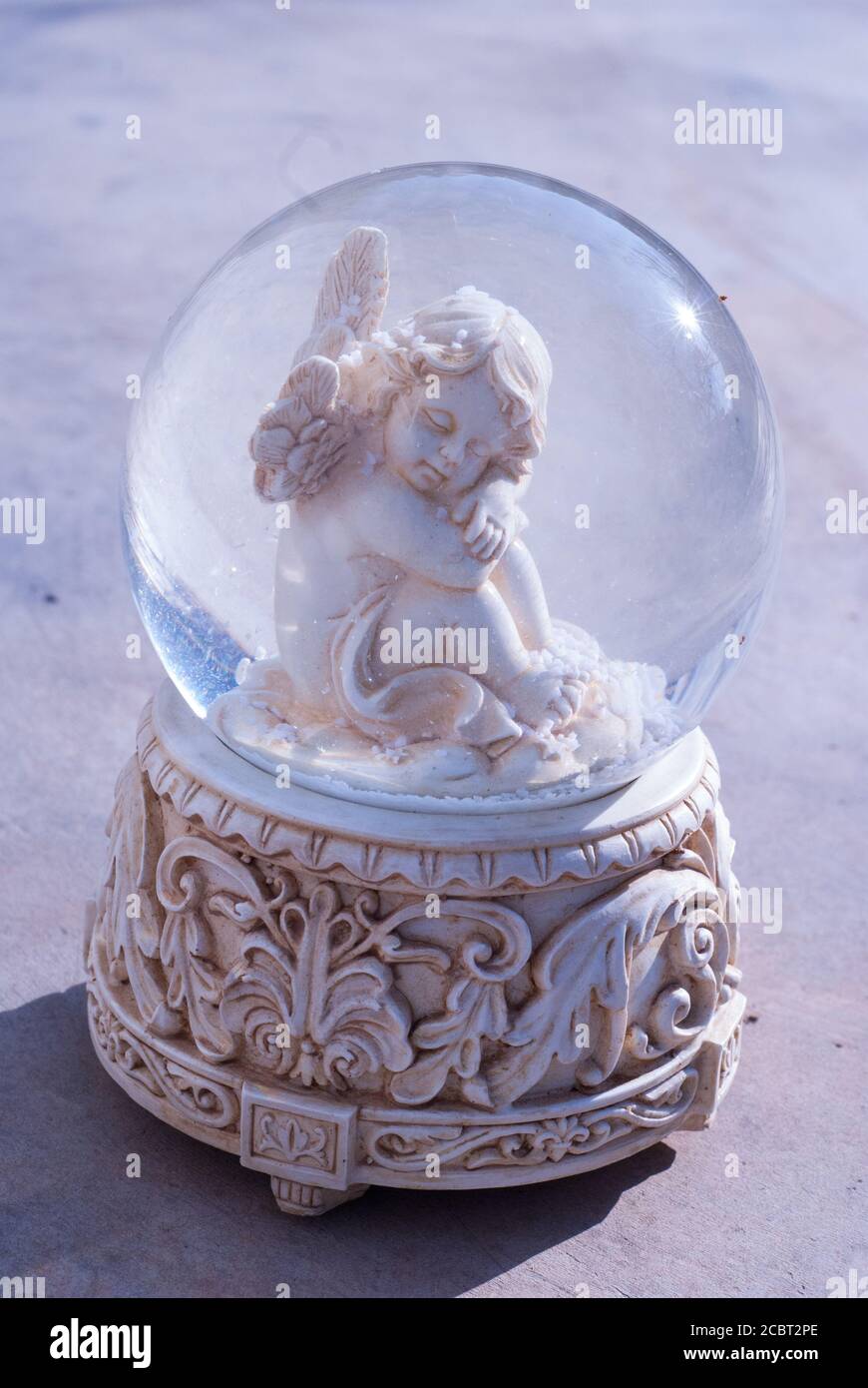 Musical Angel snow globe ornament Stock Photo - Alamy