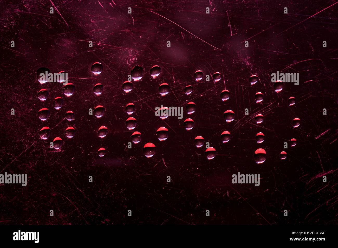 word blood is written with bright drops on a dark red background with ...