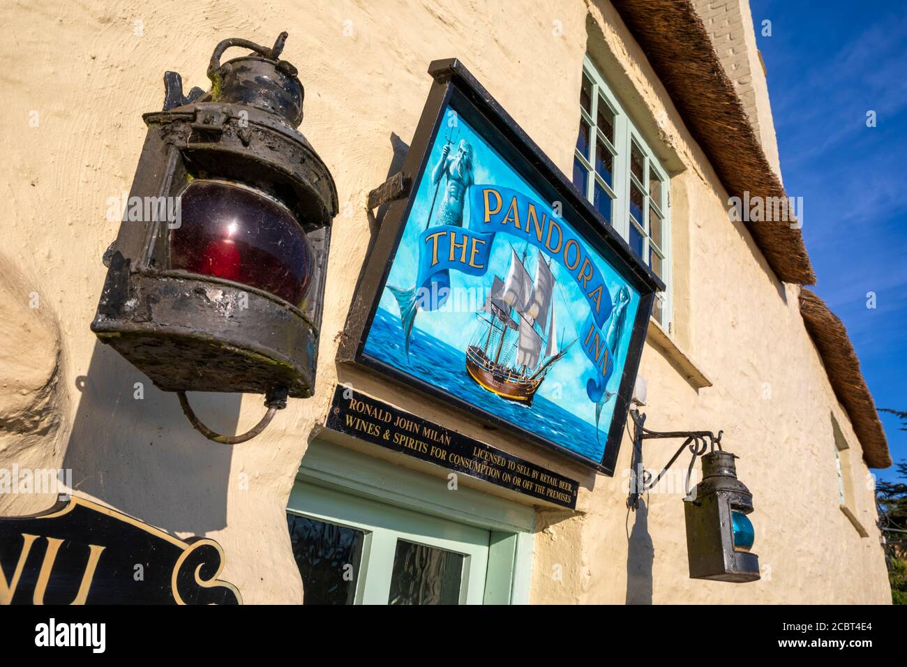 A sign over the main doorway into The Pandora Inn on Restronguet Creek ...