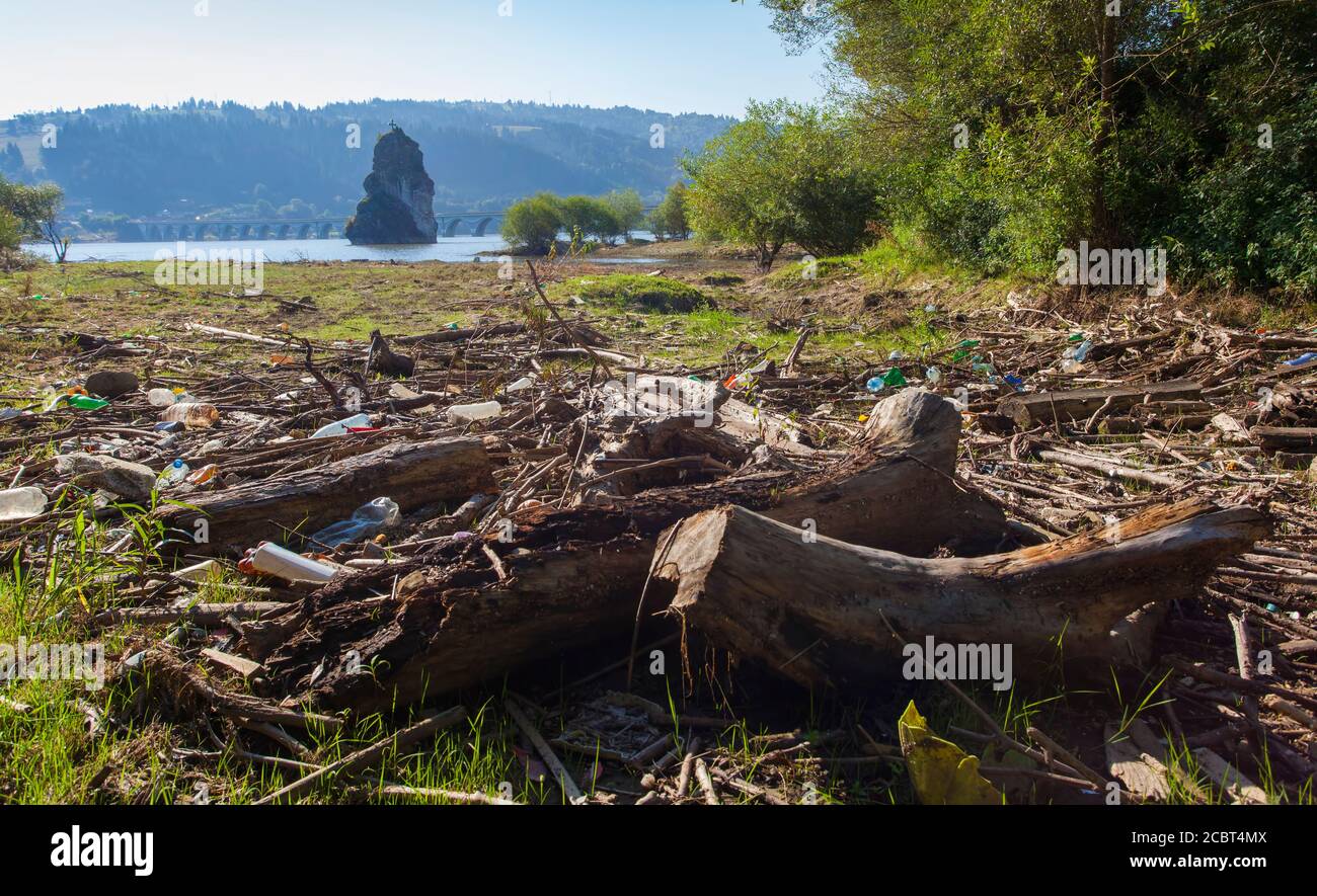 pollution with garbage or plastic waste in nature Stock Photo - Alamy