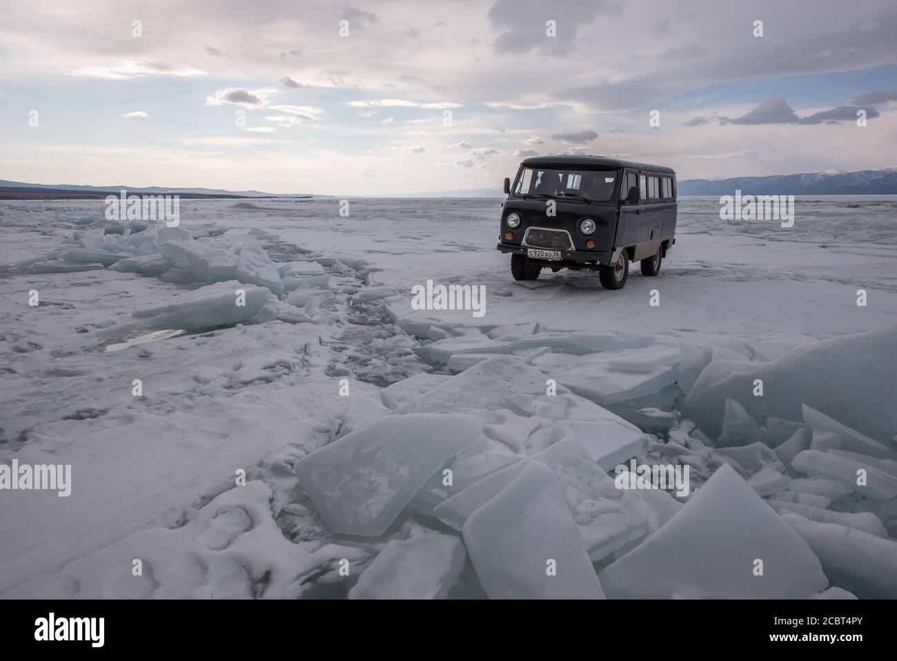 UAZ 452 van on the frozen surface of Lake Baikal, Russia Stock Photo ...