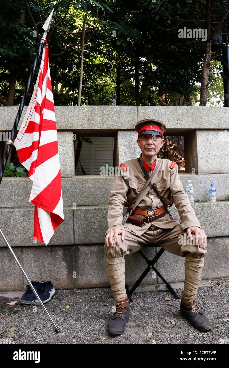 Tokyo, Japan. 15th Aug, 2020. A man dressed as a Japanese imperial army ...