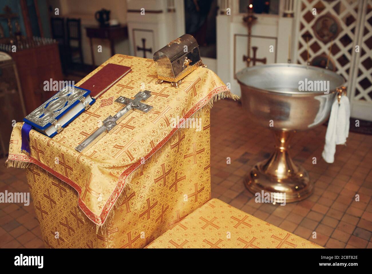 Cross in holy water font hi-res stock photography and images - Alamy