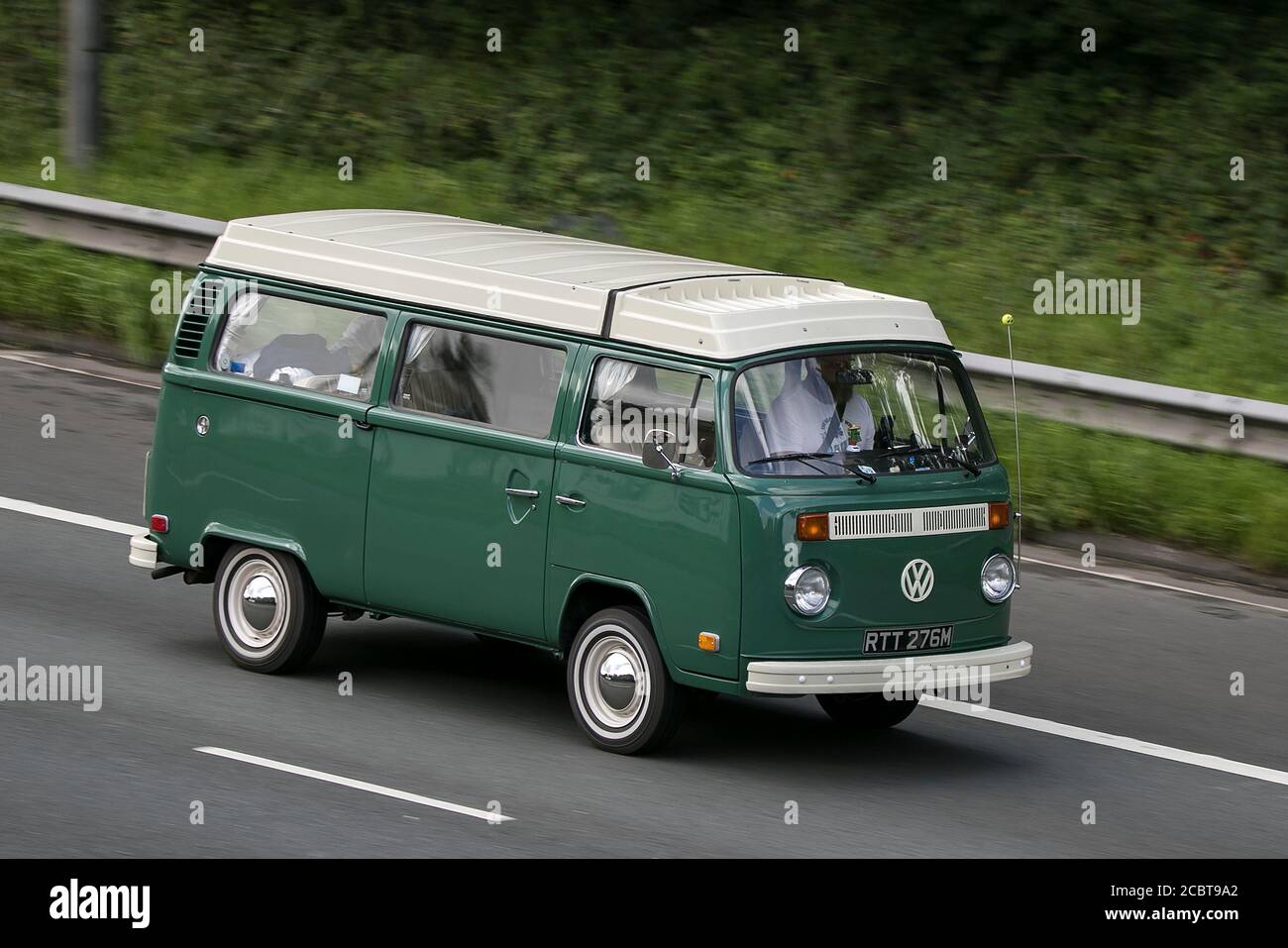 Green kombi volkswagen camper van hi-res stock photography and images ...