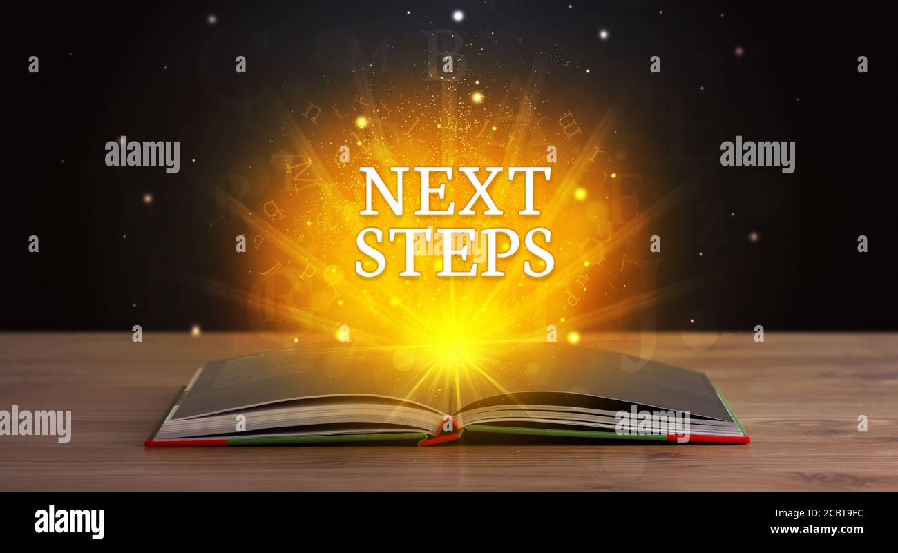 NEXT STEPS inscription coming out from an open book, educational ...