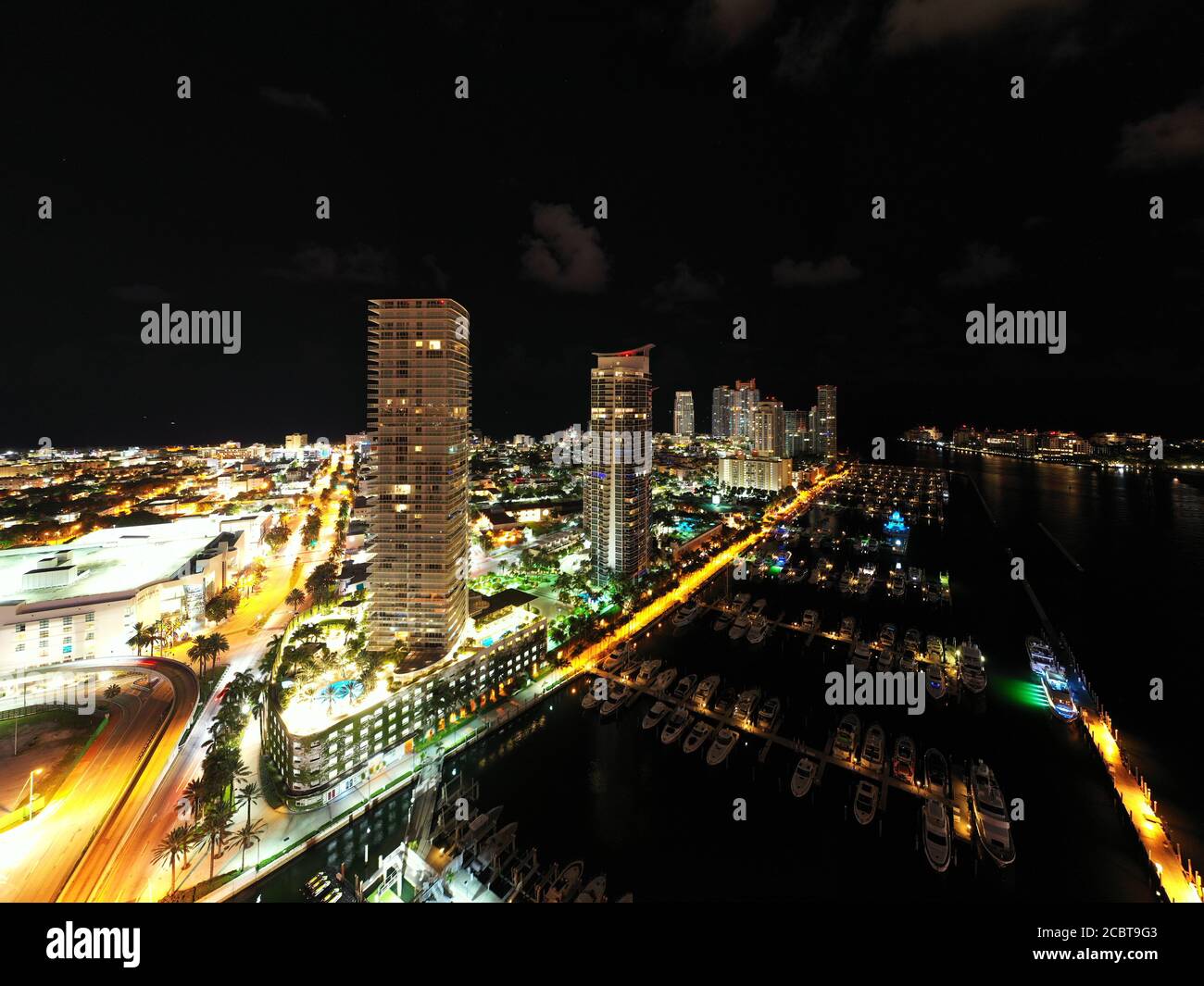 Aerial night photo Miami Beach 5th Street marina Stock Photo - Alamy