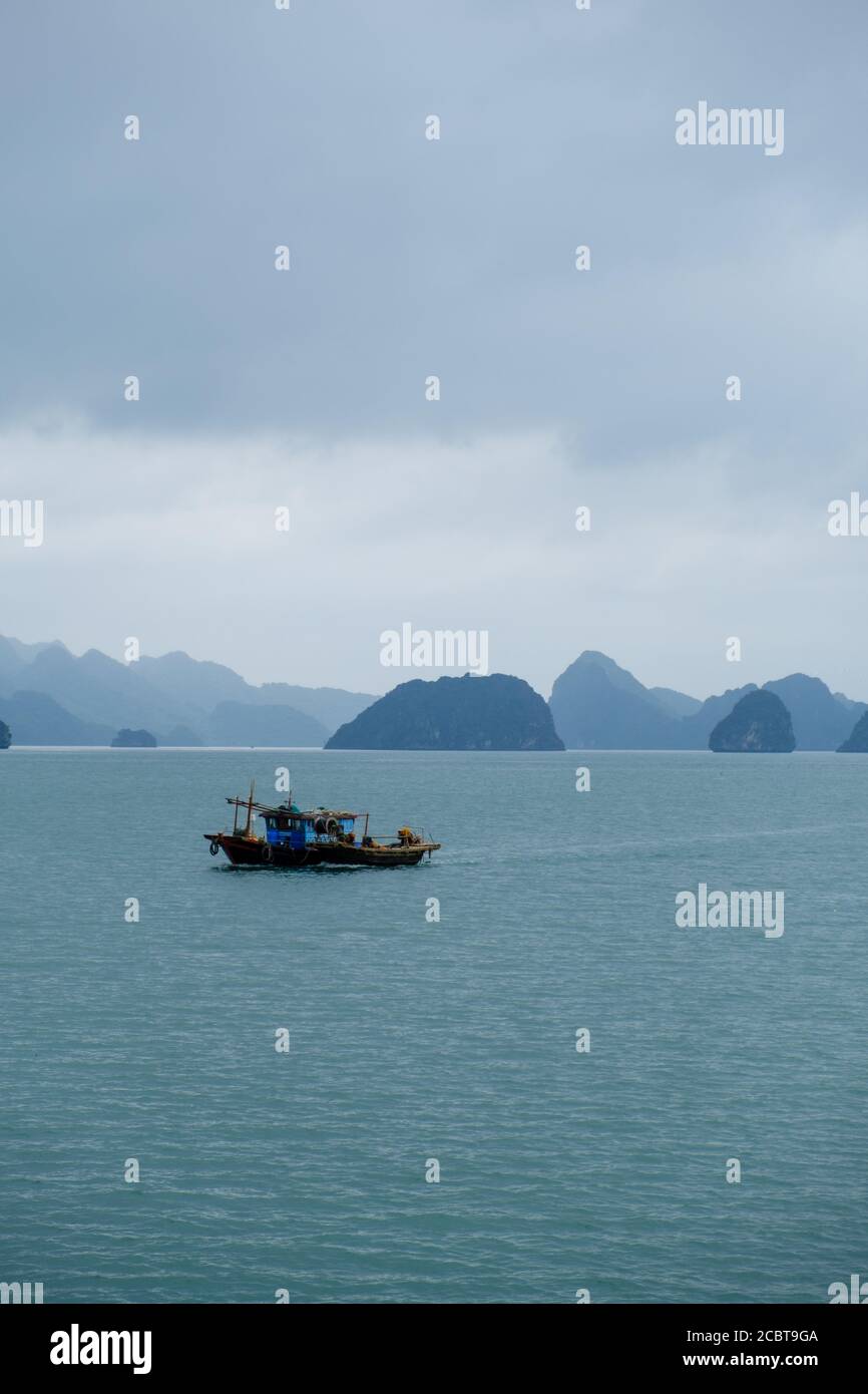 Ha Long Bay Vietnam, Fisherman village. Cloudy sky, stunning nature ...