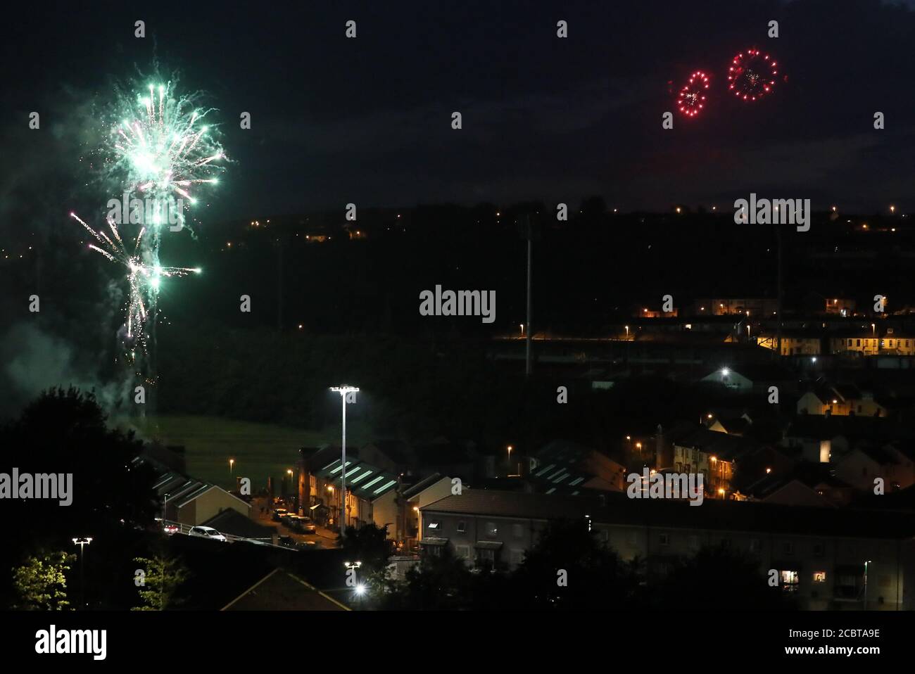 Fireworks are set off in the Bogside area of Derry City, to mark the ...