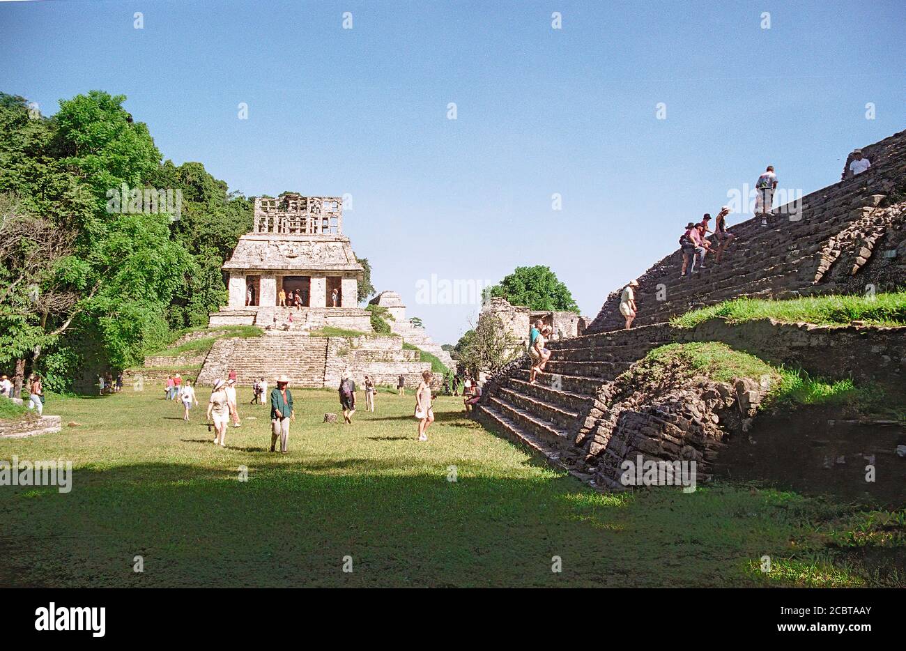 People in the Group of the Cross. Temple of the Sun (left); Steps up ...