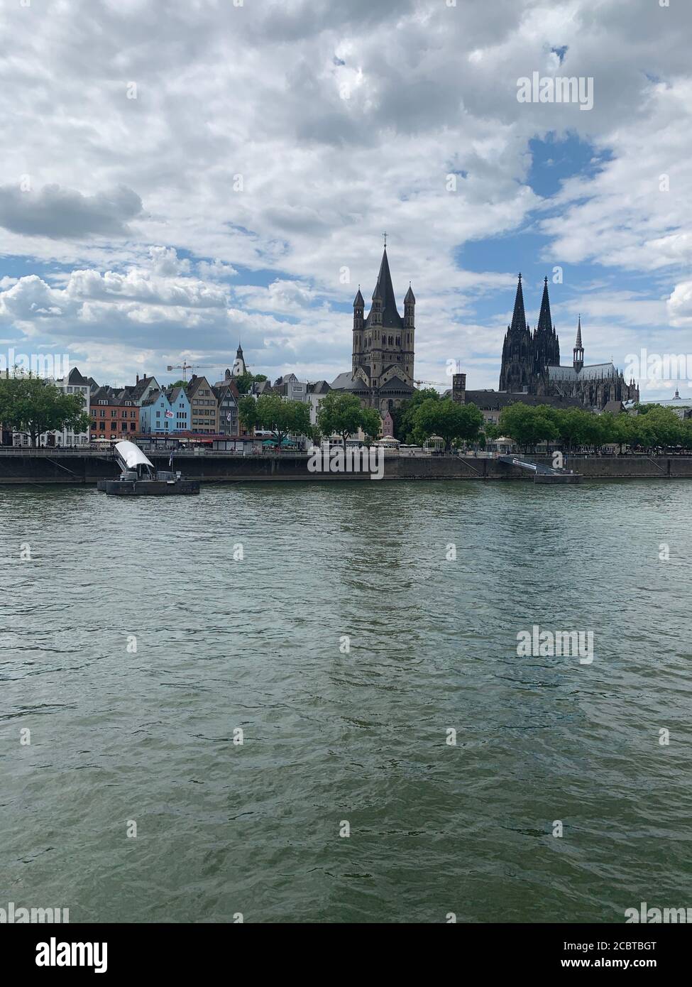 Cologne city skyline with Great St. Martin Church, Cologne Cathedral ...