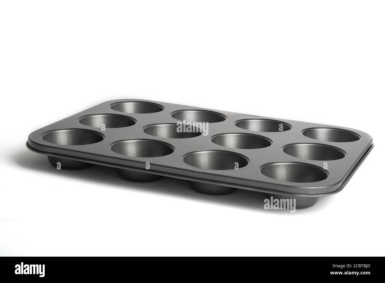 metal mold for baking and food on a white background Stock Photo - Alamy