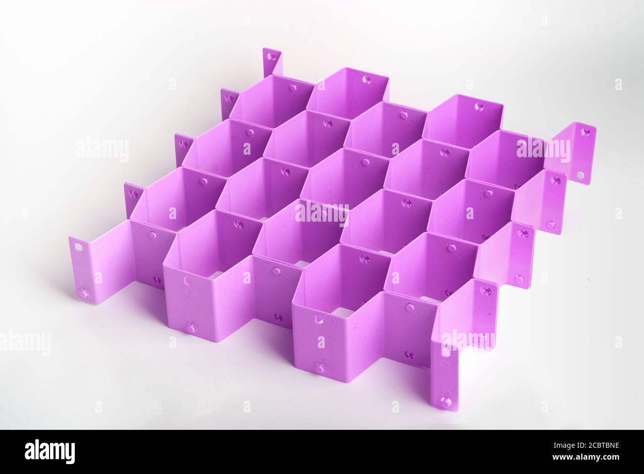 pink dividers for boxes on a white background Stock Photo - Alamy