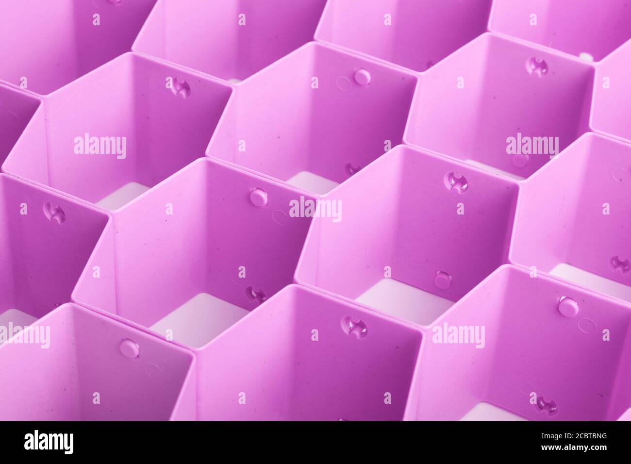 pink dividers for boxes on a white background Stock Photo - Alamy