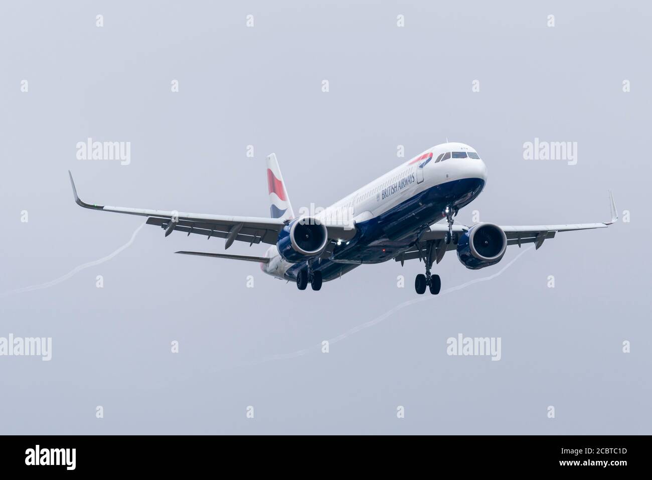 British Airways jet airliner plane landing at London Heathrow Airport ...