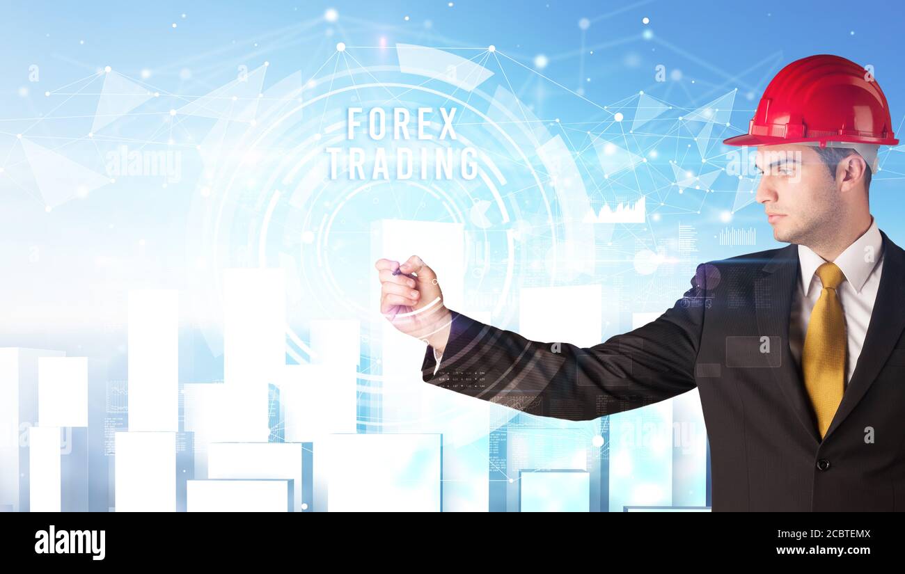 Handsome businessman with helmet drawing FOREX TRADING inscription ...