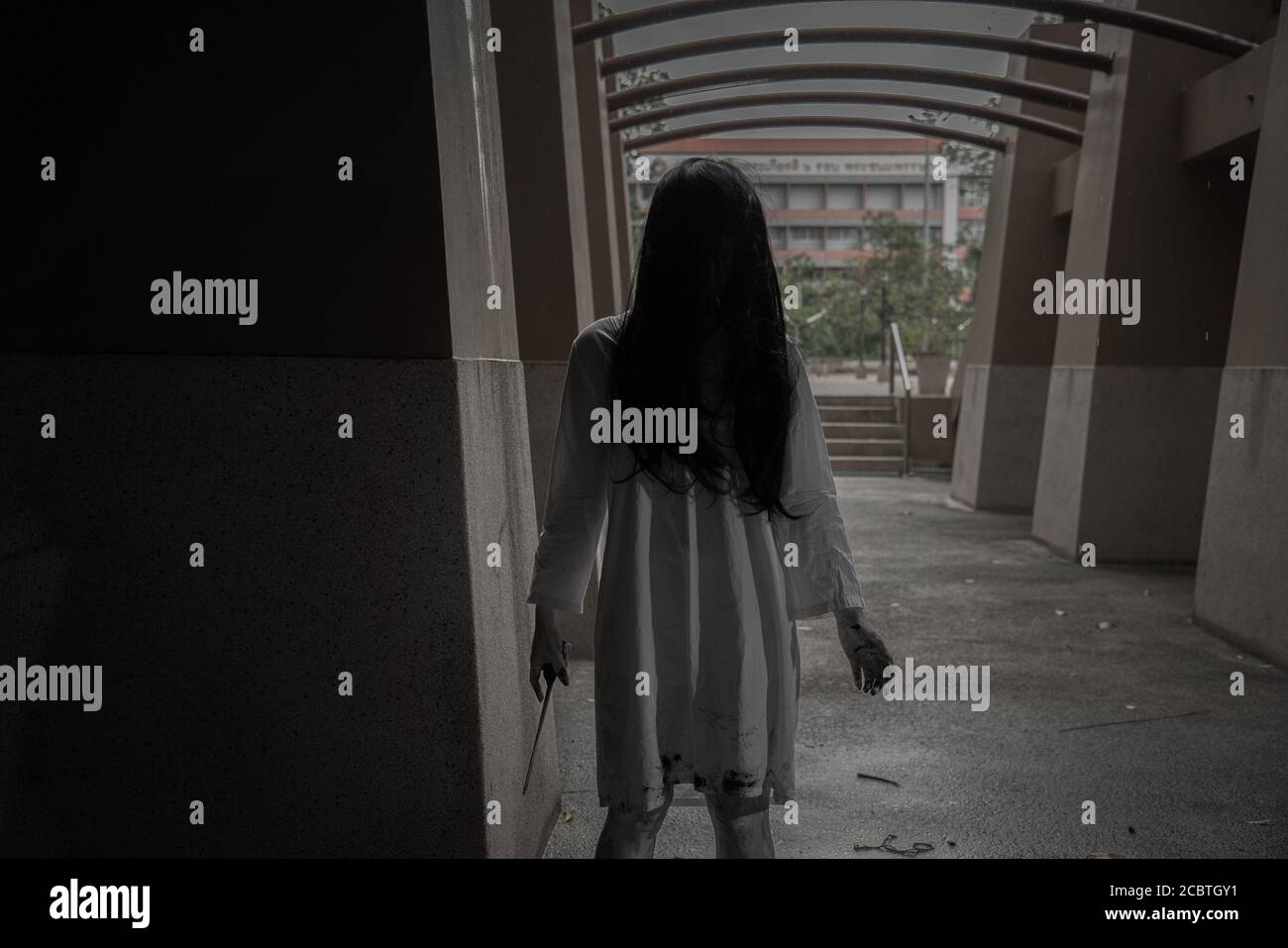 Horror woman ghost creepy standing at the house, halloween day concept ...